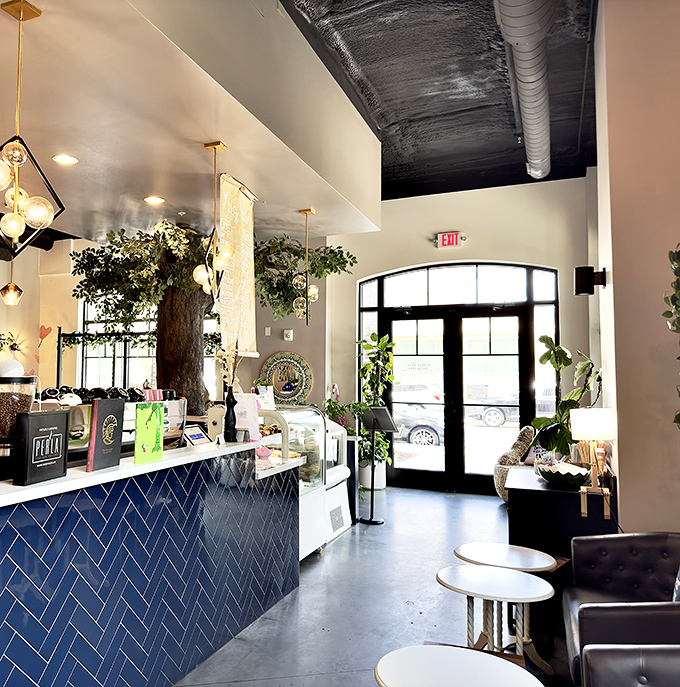 The caf&eacute;'s bright, airy exit view invites lingering, as if the doorway is saying, "Are you sure you want to return to the ordinary world?"