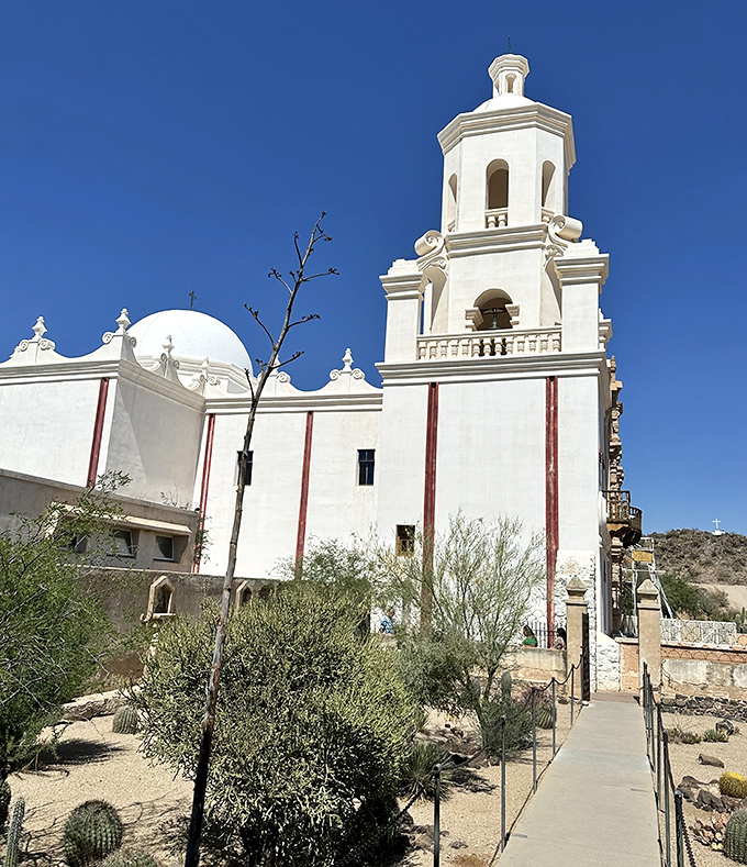 Intricate details adorn the mission's historic facade. San Xavier del Bac combines European architectural traditions with indigenous artistic influences.