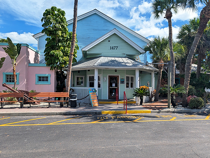 Palm trees frame this cheerful coastal building, home to "hook to plate" fresh seafood and Melbourne's favorite overwater dining deck.