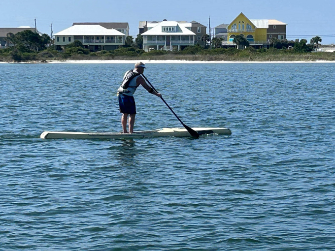 paddleboard the crystal clear water
