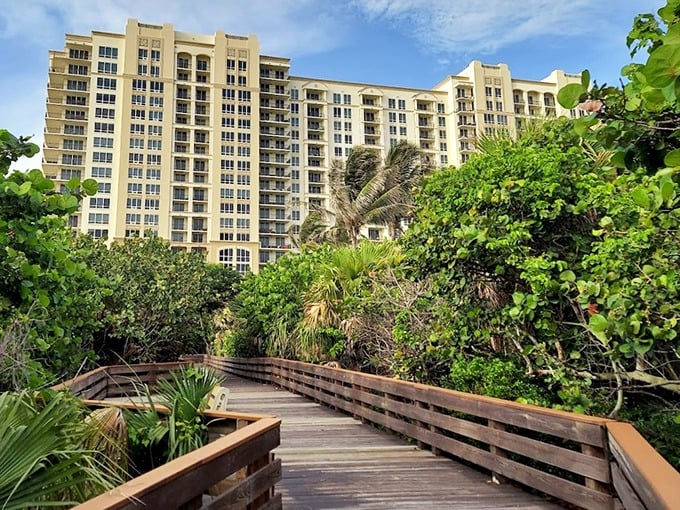 Nature's boardwalk leads you home. This wooden path through coastal wilderness feels like the yellow brick road to your beachfront Oz.