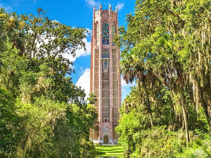 The majestic Bok Tower rises like a medieval sentinel among Florida palms, proving Gothic architecture works even in flip-flop weather.