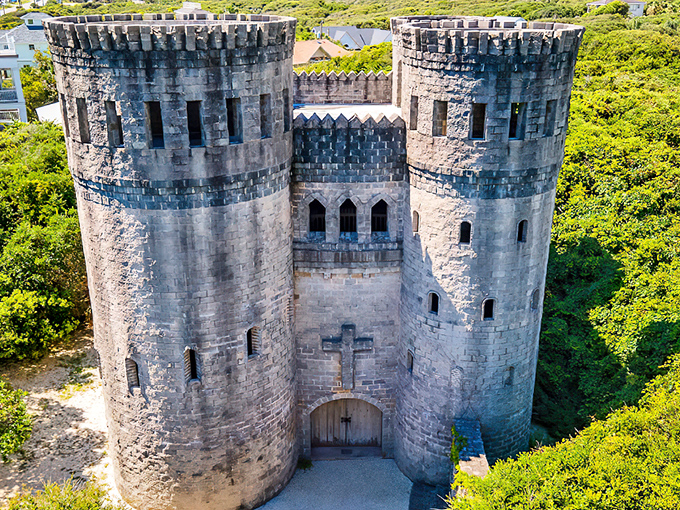 Castle Otttis stands majestically against Florida's greenery, a medieval mirage where Ireland meets the Sunshine State.