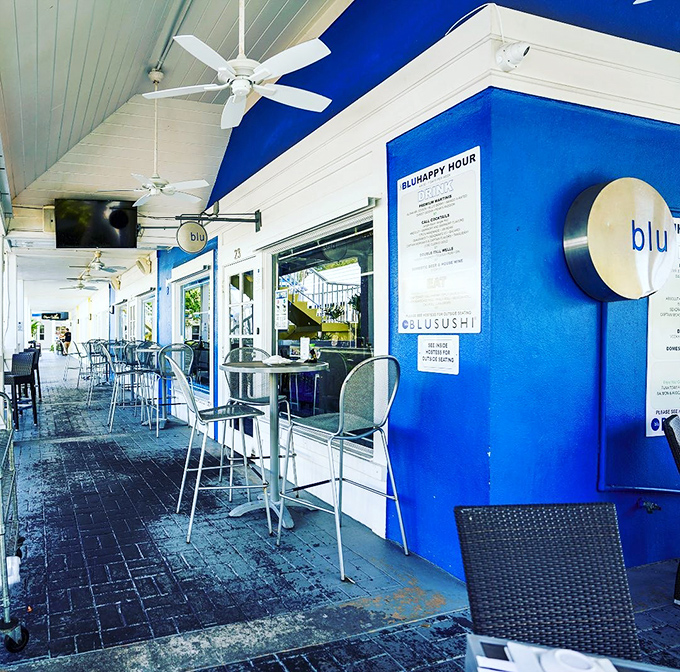 The striking cobalt blue exterior of Blu Sushi stands out like a tropical jewel in Fort Myers, promising an oceanic adventure before you even step inside.