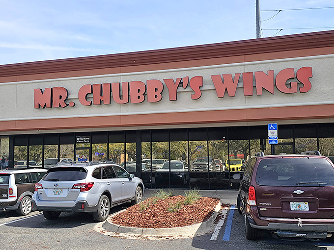 The unassuming storefront of Mr. Chubby's Wings belies the flavor explosion waiting inside. Like finding a treasure map disguised as a grocery list.