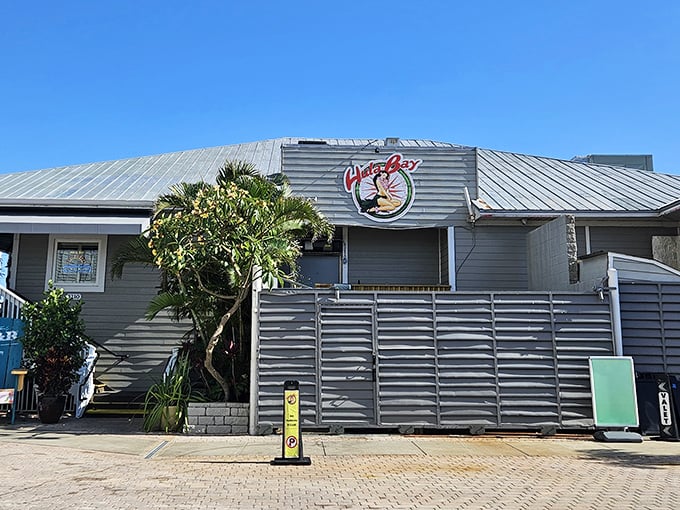 The unassuming exterior of Hula Bay plays it cool, like that friend who downplays their beachfront mansion until you step inside.