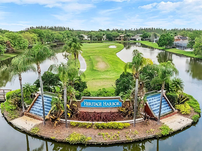 Welcome to Heritage Harbor: Where water and fairways dance together in a symphony of golf challenges and natural Florida beauty.