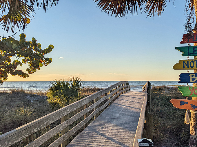 A wooden boardwalk stretches toward paradise, where the Gulf of Mexico meets a sky so blue it makes you question reality.