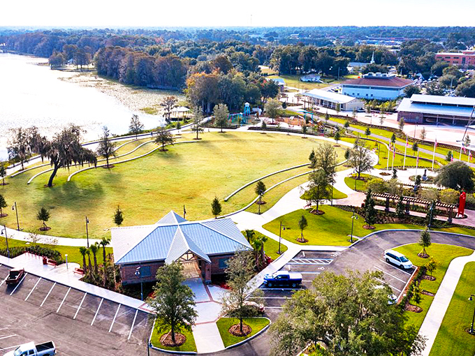 Aerial view of Liberty Park embraces Lake Henderson's shoreline, where community and nature blend in perfect harmony.