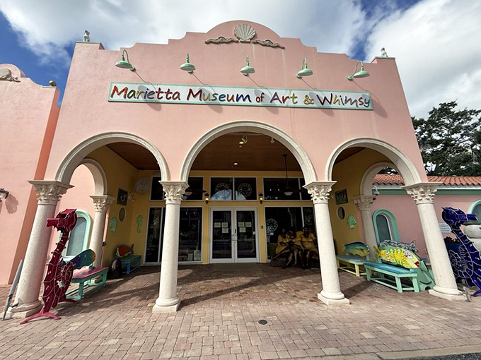The cotton-candy pink facade of Marietta Museum welcomes visitors like a warm hug, promising delights that would make even the grumpiest soul crack a smile.