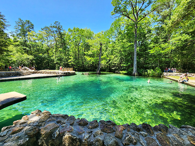 Crystal-clear emerald waters invite you to dive in at Ponce de Leon Springs, nature's perfect swimming pool in the Florida Panhandle.