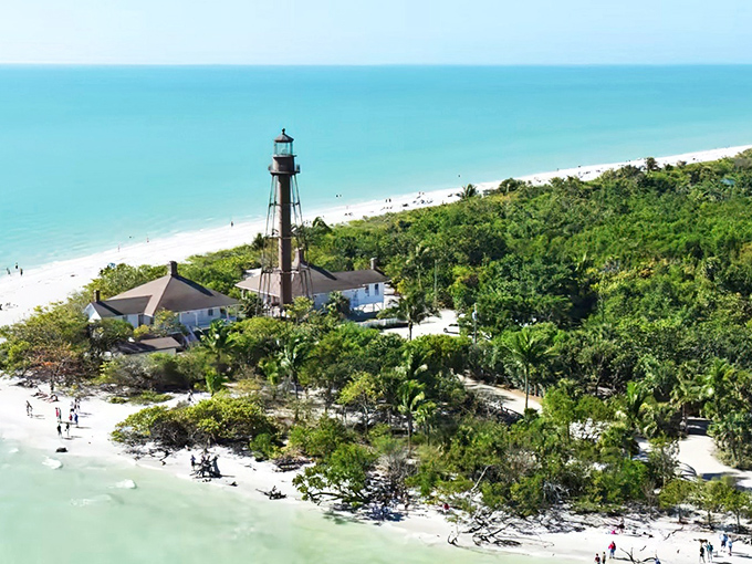 Sanibel Island: Where the iconic lighthouse stands sentinel over a shell-seeker's paradise, nature's jewelry box spilled across turquoise waters.