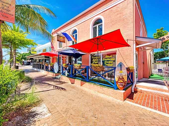 Siesta Key Village welcomes visitors with its coral-hued storefronts, vibrant awnings, and palm-lined walkways &ndash; Florida's answer to stress relief.