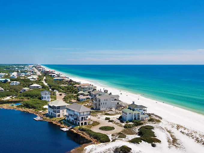 South Walton's stunning coastline where sugar-white beaches meet emerald waters, creating a postcard-perfect panorama that no filter could improve.