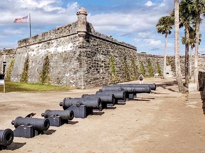 The imposing coquina walls of Castillo de San Marcos stand sentinel over St. Augustine, looking ready to repel invaders or welcome curious history buffs.