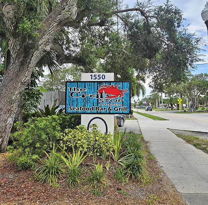 The Crab Stop of Sebastian: A blue sign beckons seafood lovers like a siren call, promising garlic-infused treasures that will haunt your dreams for weeks.
