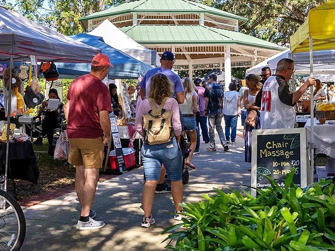 The iconic green-roofed gazebo stands like a tropical crown jewel at Safety Harbor's Market on Main, where Florida's community spirit comes alive every Sunday.