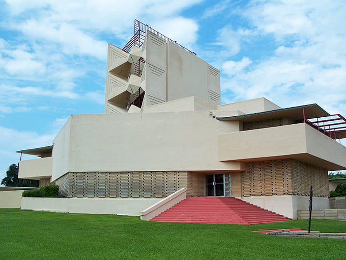 The Annie Pfeiffer Chapel rises like a geometric prayer, proving Wright knew how to make concrete look downright heavenly.