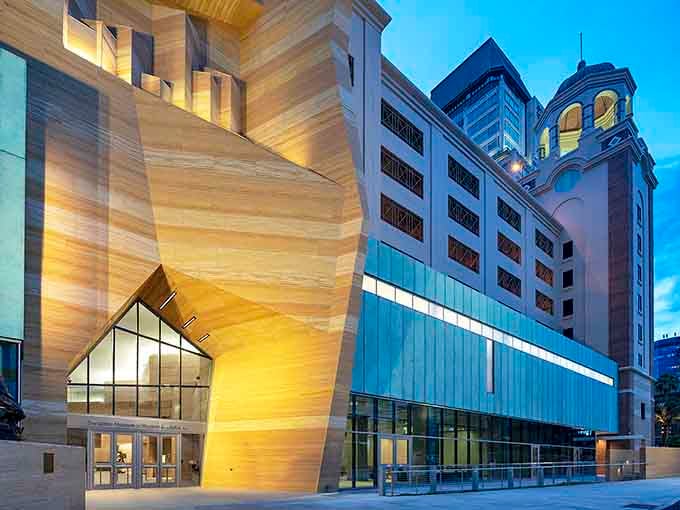 The museum's striking contemporary facade looks like frozen waves, proving that Florida can do Western with serious architectural flair.