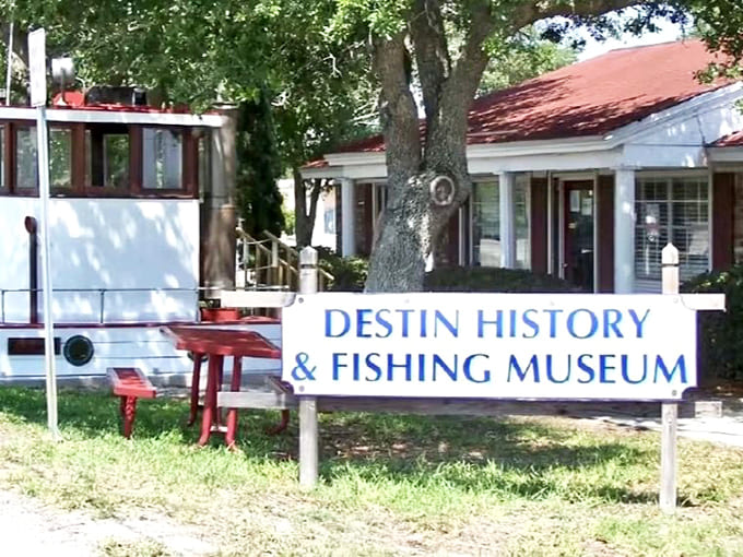 The welcoming entrance promises tales of fishing glory and coastal heritage waiting just beyond that door.