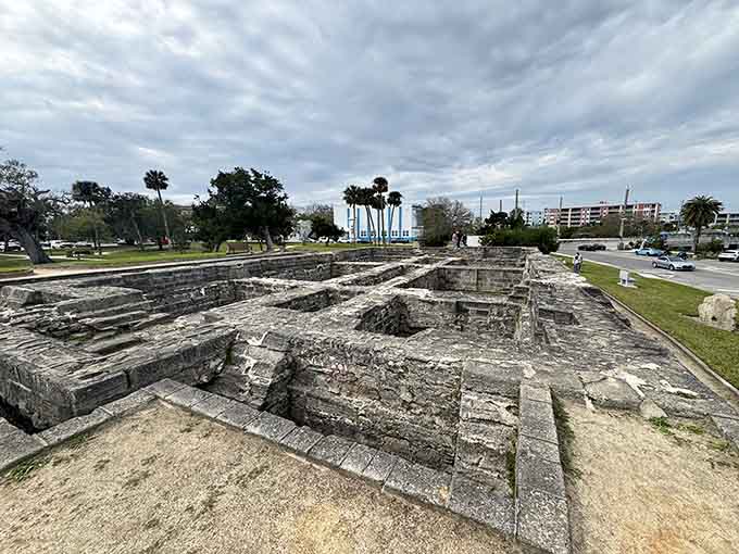 The Turnbull Ruins spread across Old Fort Park like a stone puzzle waiting to be solved, their coquina walls whispering secrets that historians still debate.
