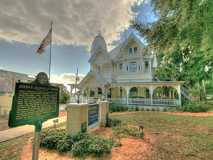 The Donnelly House stands like a Victorian wedding cake, all yellow and white frosting, minus the calories but with possibly more permanent residents than the guest book suggests.