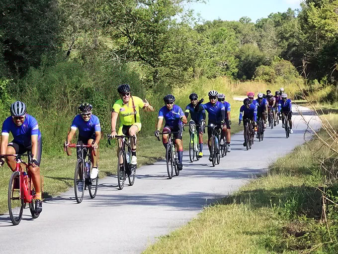 Cyclists form a colorful parade along the Withlacoochee State Trail, where rubber meets road and worries melt away like ice cream in July.