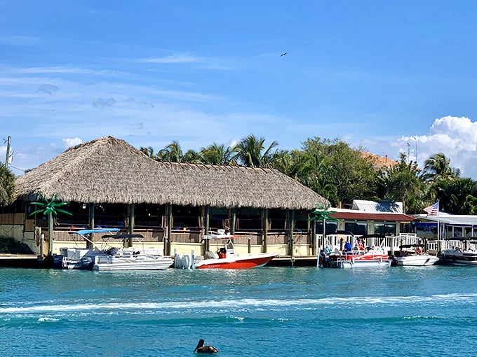 Where paradise meets plate: Pop's thatched-roof haven beckons boaters and food lovers alike to dock their worries at the Intracoastal's edge.
