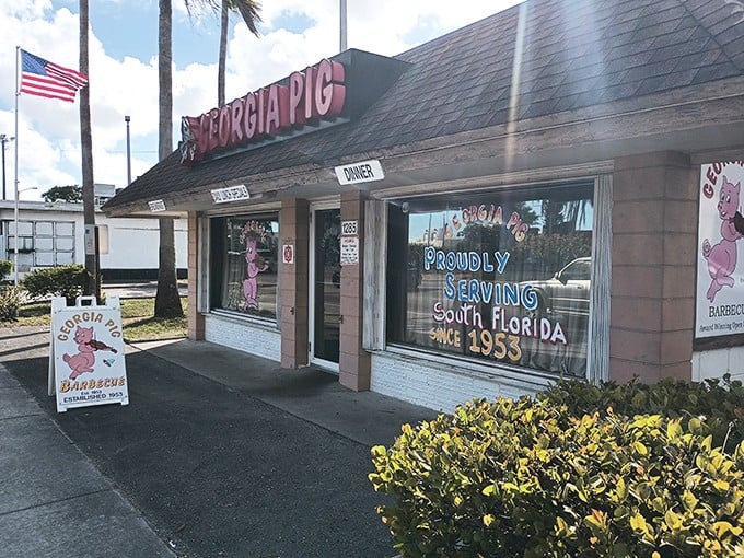 The unassuming roadside charm of Georgia Pig, proudly serving Fort Lauderdale since 1953. Some buildings don't need fancy facades when what's inside is pure magic.