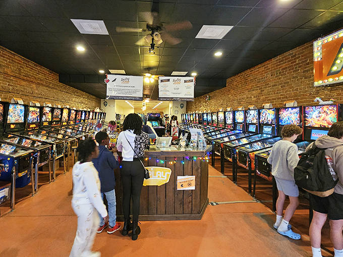 The heart of Replay's operation, where friendly staff keep the quarters flowing and the gaming memories alive.