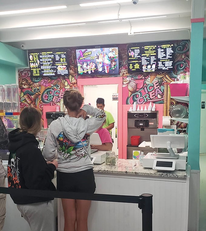 The anticipation is palpable as customers contemplate their sweet destiny, studying the menu like it contains the secrets of the universe.