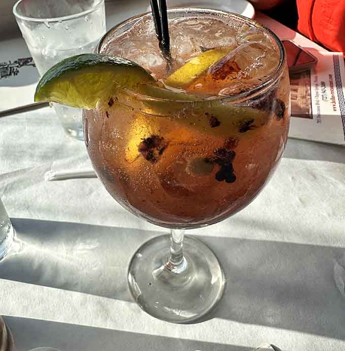 Passion fruit sangria in a generous glass&mdash;because your Greek feast deserves a drink that's equally festive and refreshing.