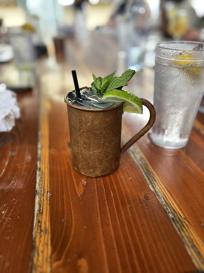 Moscow Mules taste better when served in a proper copper mug with fresh mint – it's not just tradition, it's science.