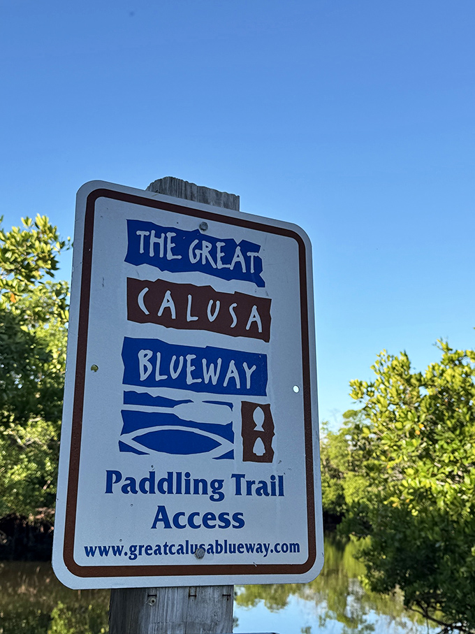 The Blueway sign stands as a humble gateway to adventure &ndash; less "You Are Here" and more "Why Aren't You Already Paddling?"