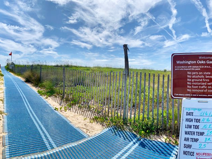 The boardwalk beckons with promises of Atlantic views and the day's vital statistics posted for serious beachgoers.
