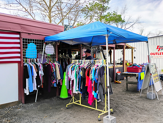 Racks of clothing flutter in the Florida breeze under blue canopies, a rainbow of fabrics offering fashion-forward finds without the mall price tags.