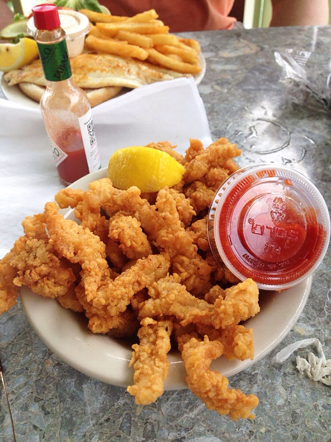 Fried clams so light and crispy they practically float off the plate, demanding a squeeze of lemon and moment of silence.