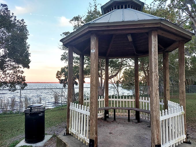 This lakeside gazebo has witnessed more marriage proposals and sunset contemplations than it could possibly count.