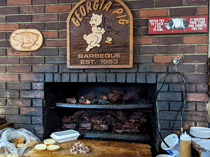 The brick pit where magic happens daily. Like watching Michelangelo at work, except the masterpiece gets devoured instead of displayed.