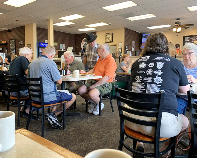 The dining room hums with the beautiful breakfast symphony of clinking forks, coffee pours, and "pass the syrup" requests.
