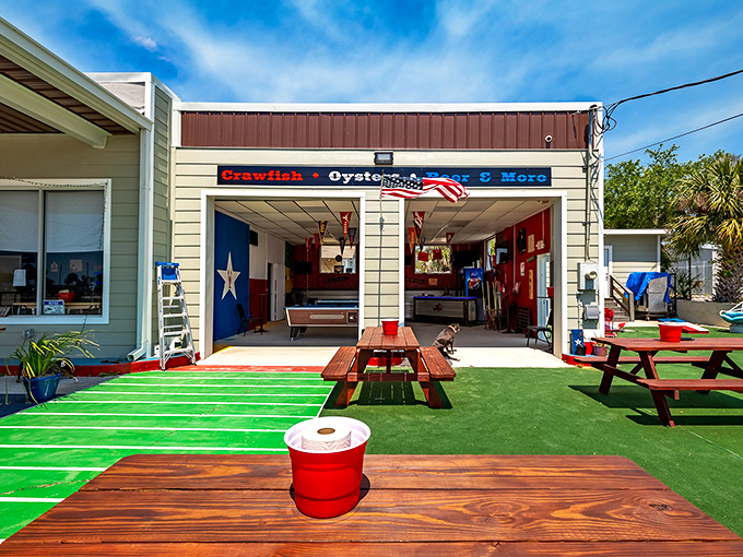 Lone Star brings Texas spirit to Florida seafood with its open-air dining concept. The bright green turf and picnic tables create a festive atmosphere.