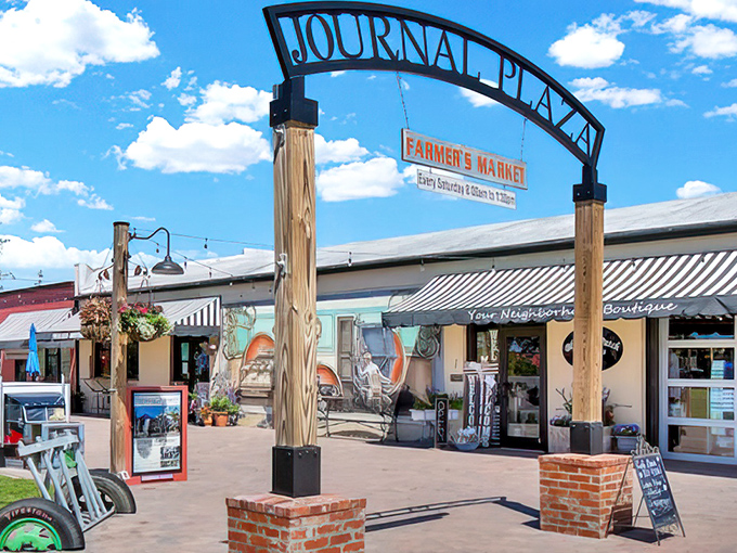 Market day magic! Journal Plaza's welcoming arch invites visitors to stroll where farmers' fresh produce meets small-town hospitality.