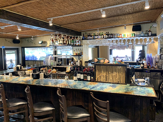 The heart of hospitality with its striking countertop, where bartenders craft memories alongside perfectly balanced drinks.