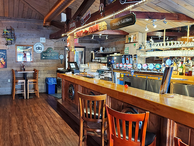 The honey-colored wooden bar is where stories are shared and friendships formed over cold drinks and maritime memorabilia.