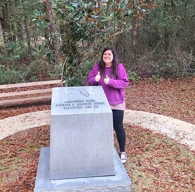 Visitors celebrate their summit success with the enthusiasm typically reserved for actual mountain climbing, because context is everything and this is Florida's Everest, after all.