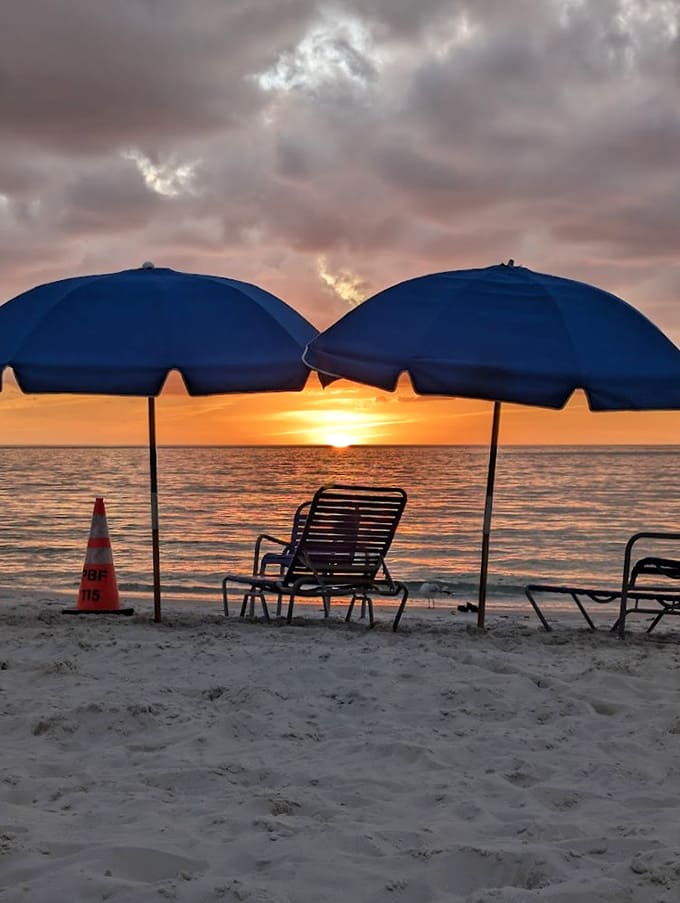 The pristine shoreline stretches endlessly, proving that sometimes the best things in life really are free, or at least very affordable.