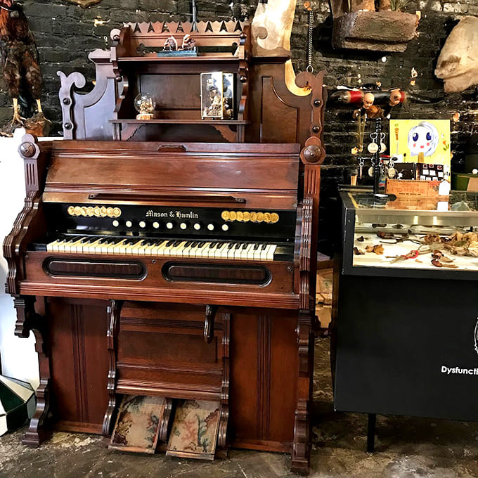 A pump organ that's played more funeral dirges than birthday songs, and it shows.