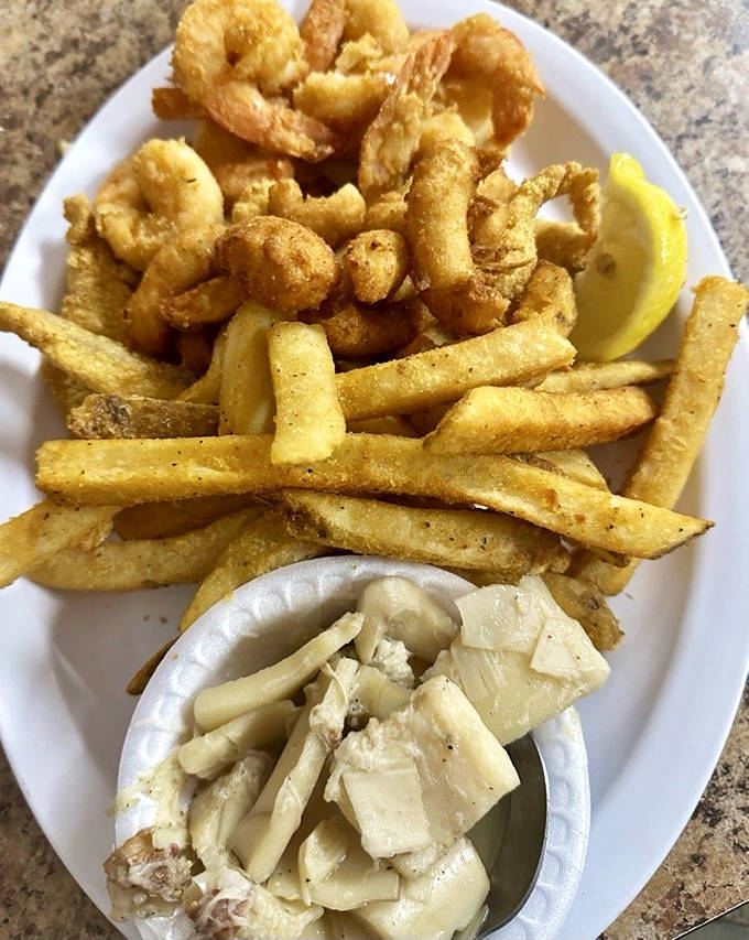 The ultimate indecision solution: a combo platter featuring golden fried catfish and shrimp with sides that complement rather than compete. Decision-making has never been so delicious.