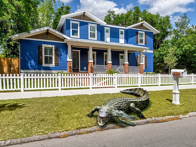 Real estate with reptilian appeal &ndash; this Seminole Heights home comes complete with its own front yard gator guardian.