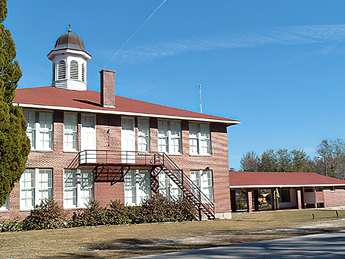 External staircases and walkways add character to the building's profile while providing functional access to upper floors.